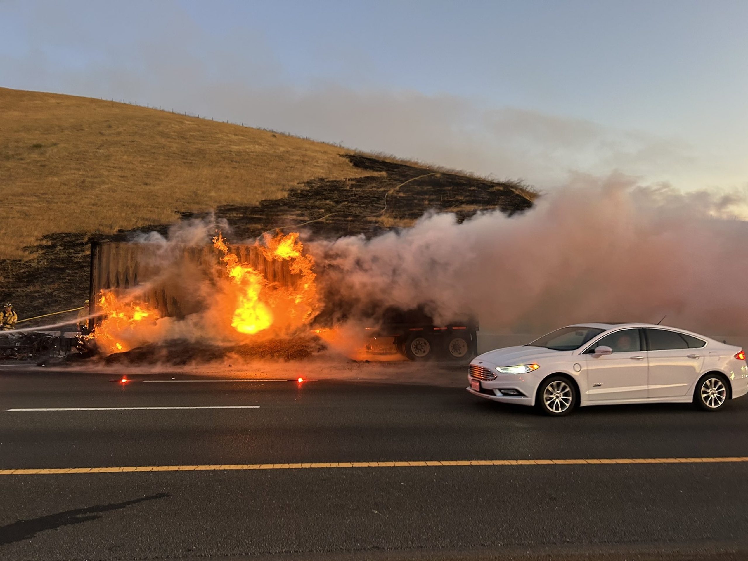 Big-rig fire sparks vegetation blaze, shuts down westbound I-580 ...